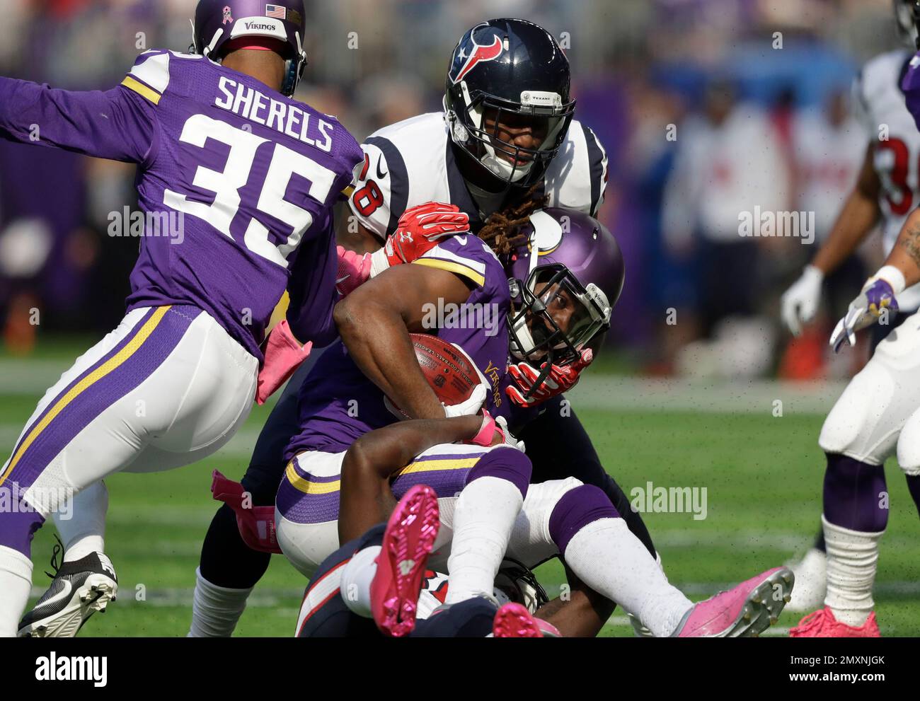 Minnesota Vikings wide receiver Cordarrelle Patterson is tackled by Houston Texans' Alfred Blue ...
