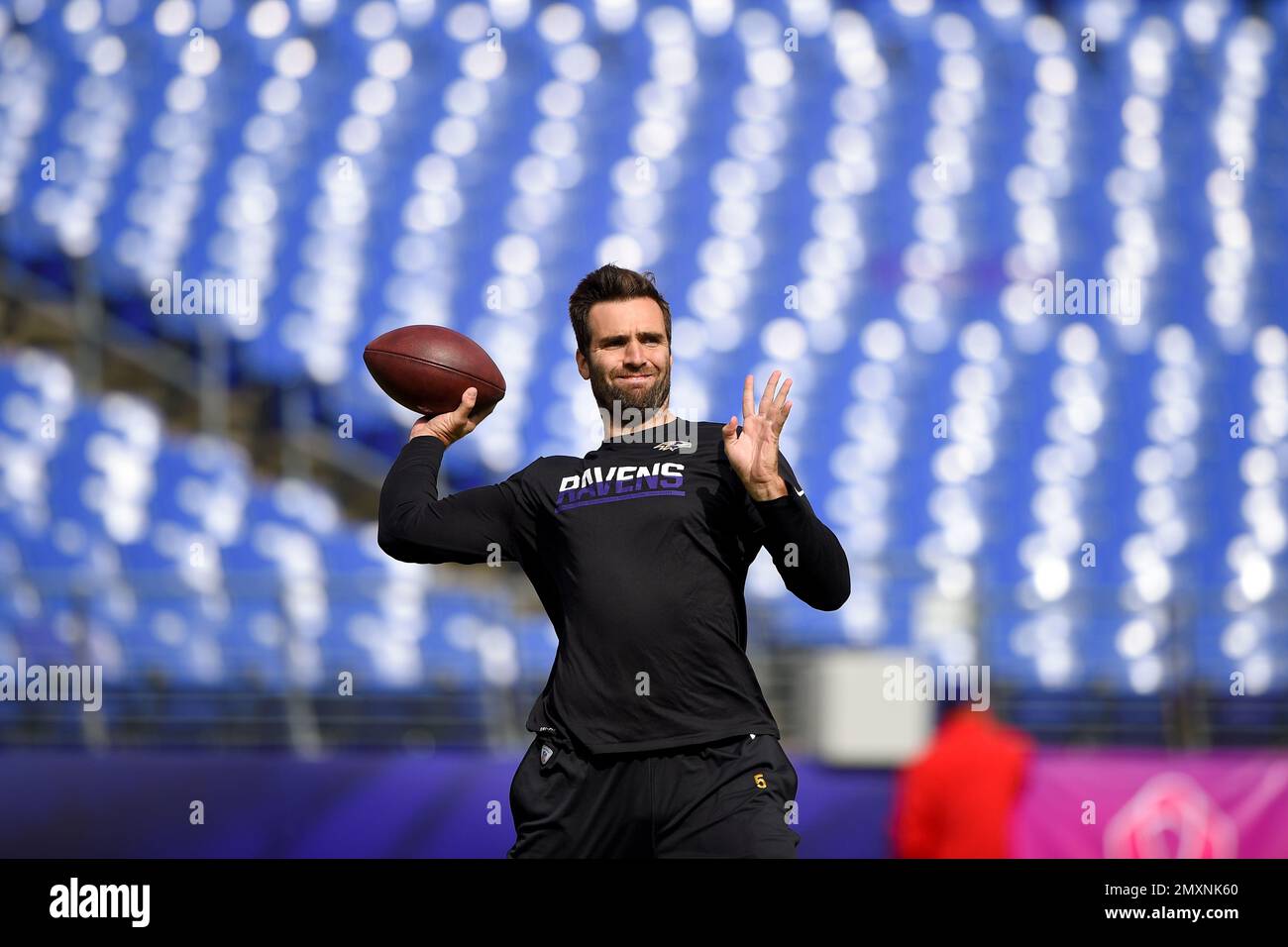 Baltimore Ravens' Joe Flacco warms up before an NFL football game ...