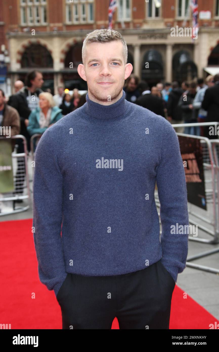 Actor Russell Tovey poses for photographers upon arrival at the ...