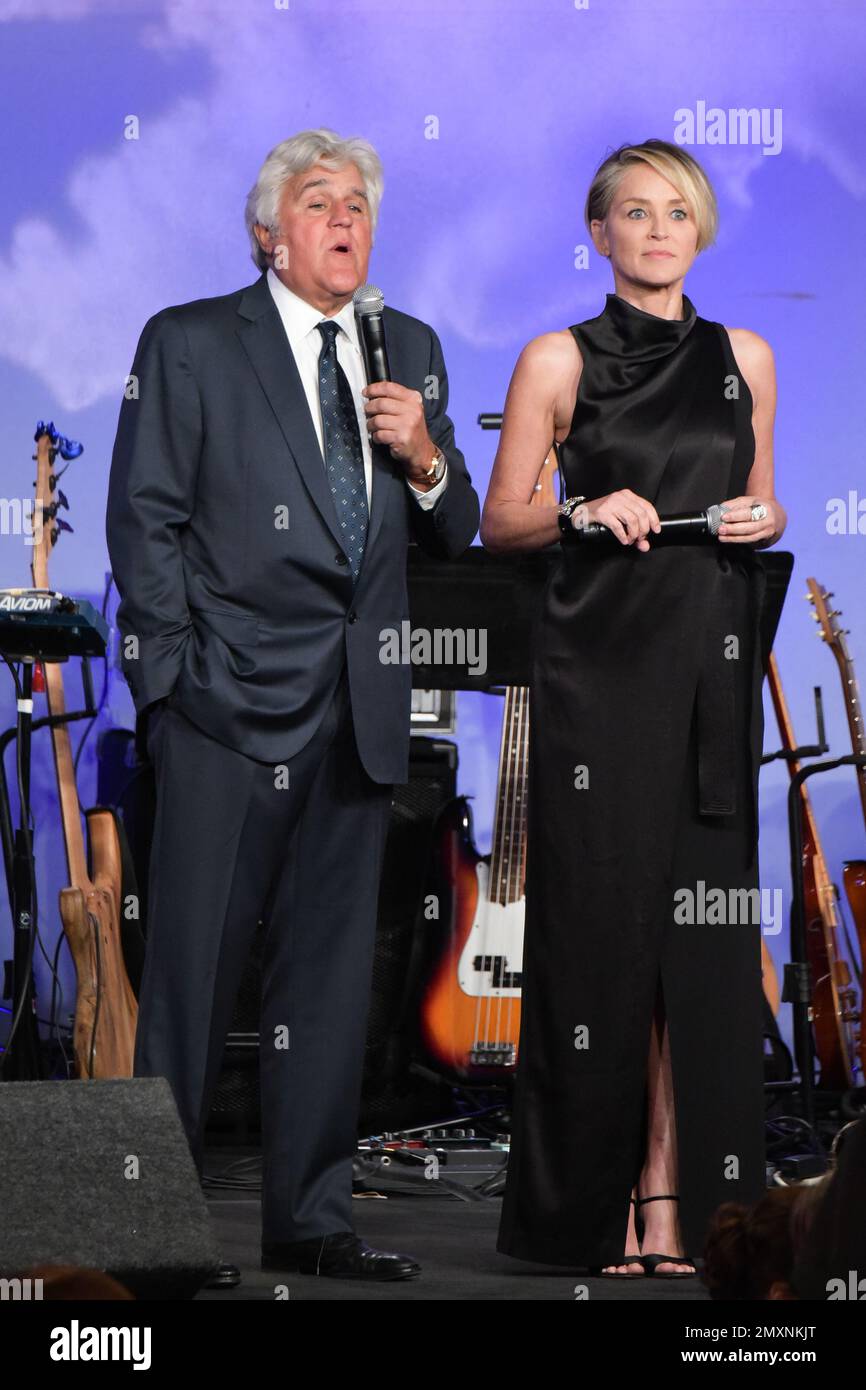 Jay Leno, left, and Sharon Stone speak onstage at the 2016 Carousel Of ...