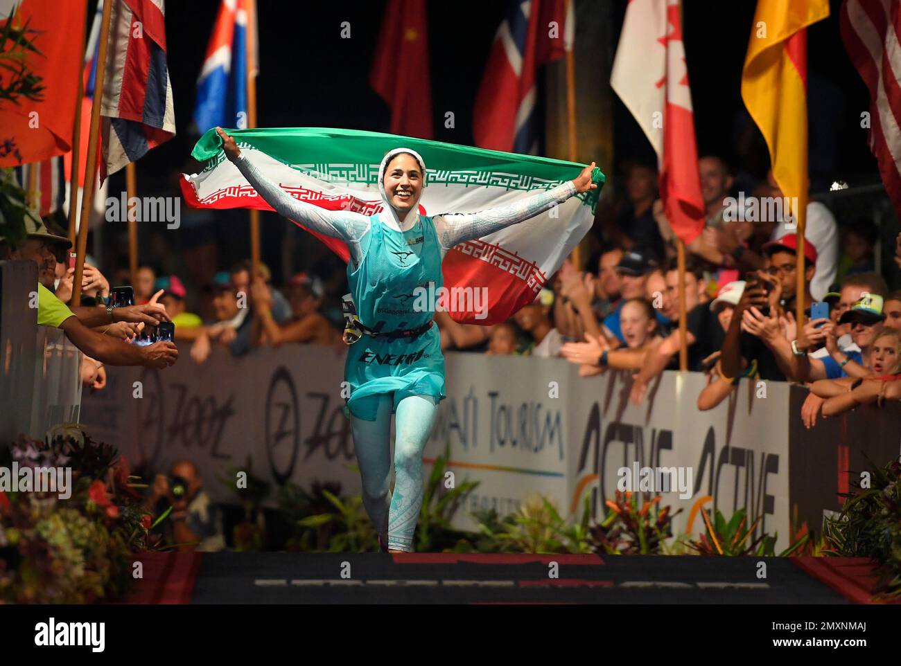 Shirin Gerami, Iran’s first female triathlete, celebrates as she ...