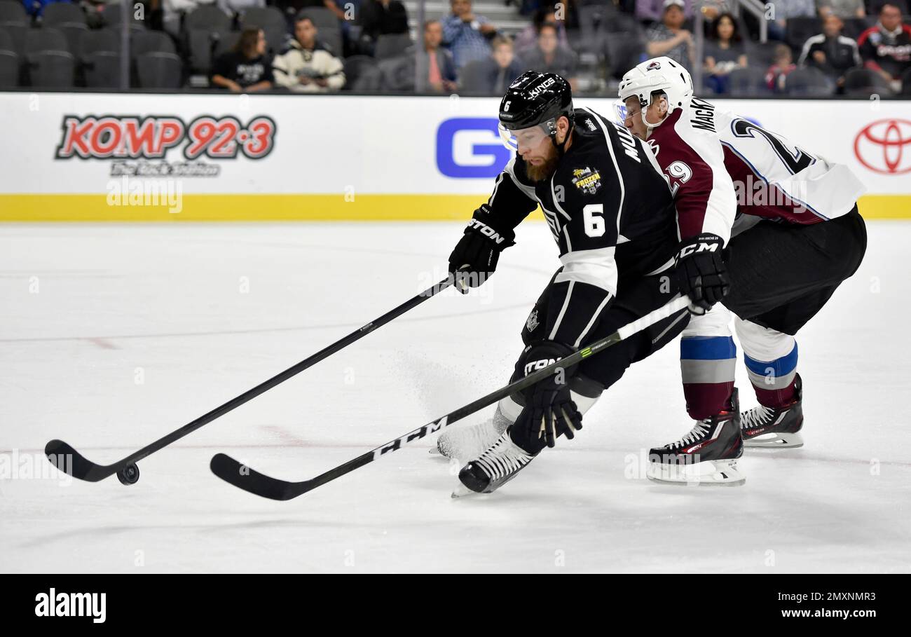 Los Angeles Kings’ Jake Muzzin (6) and Colorado Avalanche’s Nathan ...
