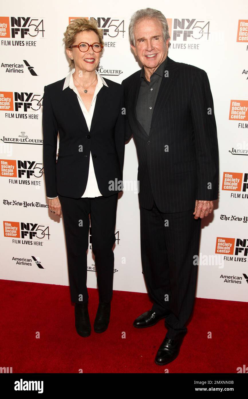 Annette Bening, left, and Warren Beatty, right, attend the world ...