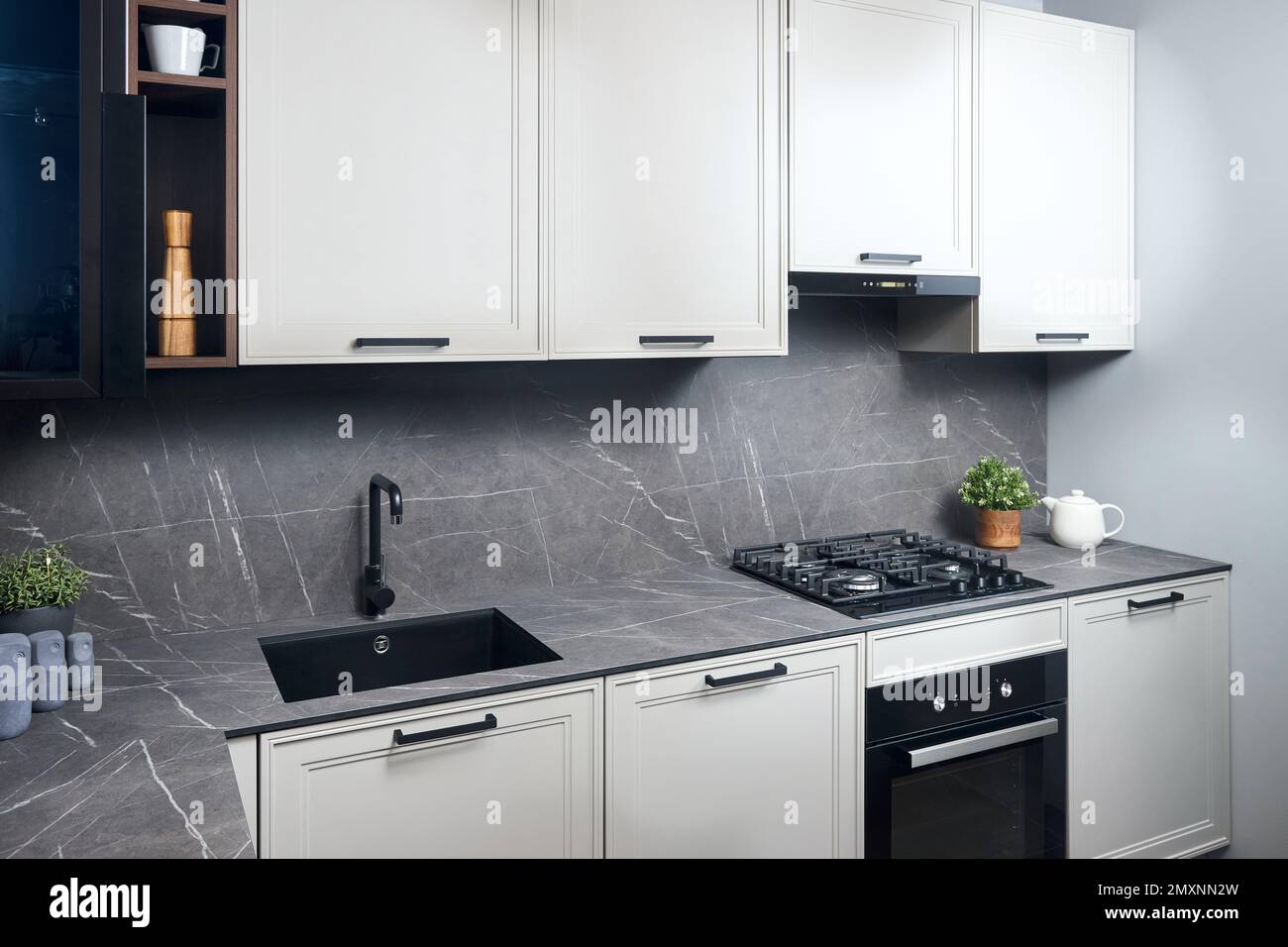 Interior of white and grey kitchen, horizontal, linear layout. Luxury ...