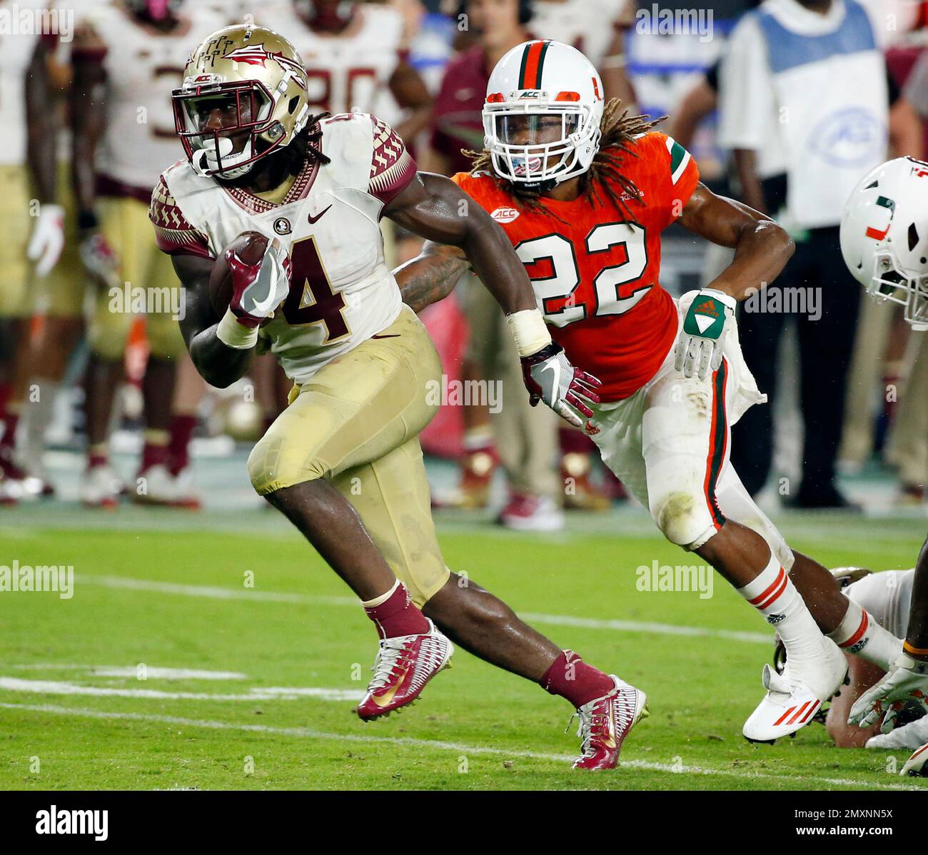 Florida State running back Dalvin Cook (4) carries the ball ahead of ...