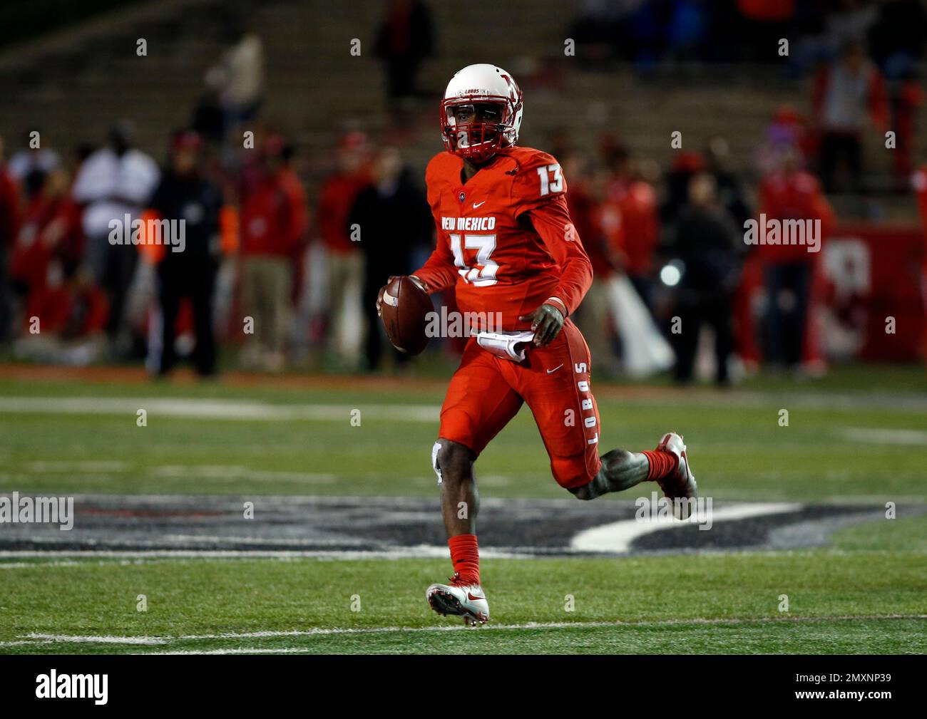 New Mexico quarterback Lamar Jordan searches for a receiver during the ...
