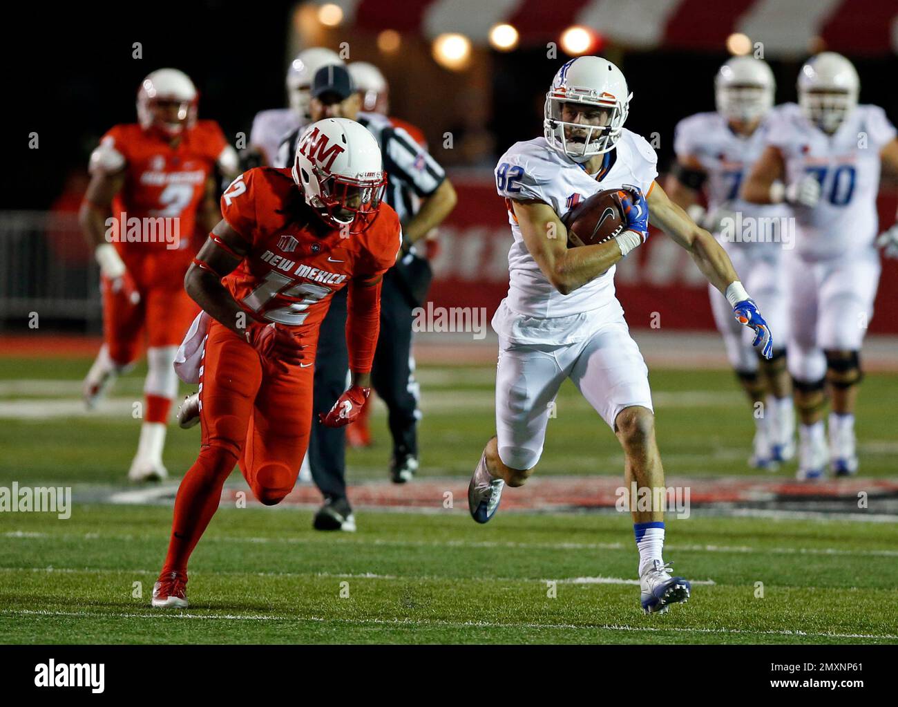 Boise State wide receiver Thomas Sperbeck (82) runs for yardage as New ...