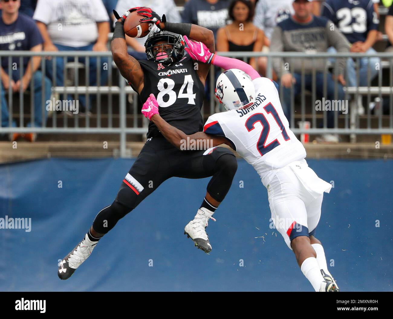 Cincinnati wide receiver Nate Cole (84) goes up for a pass over ...
