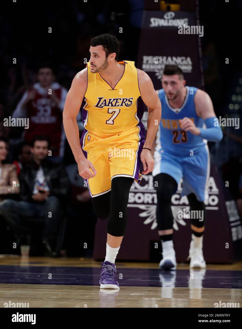 Los Angeles Lakers' Larry Nance Jr. makes his way down the court during ...