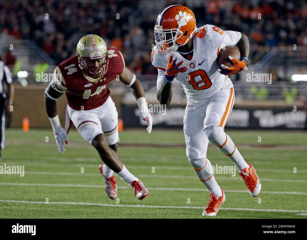 Clemson wide receiver Deon Cain (8) runs for a touchdown past Boston ...