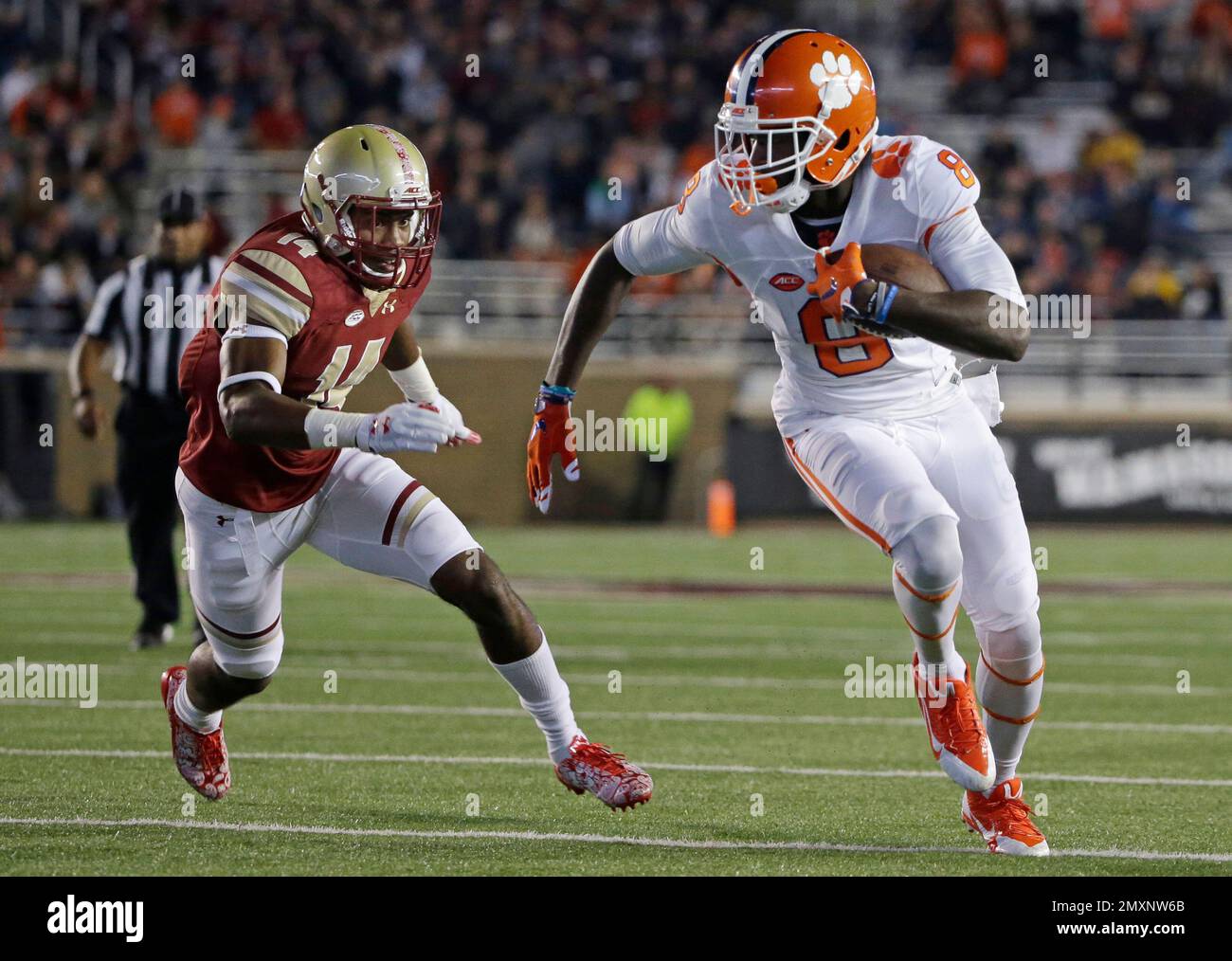 Clemson wide receiver Deon Cain (8) runs for a touchdown past Boston ...