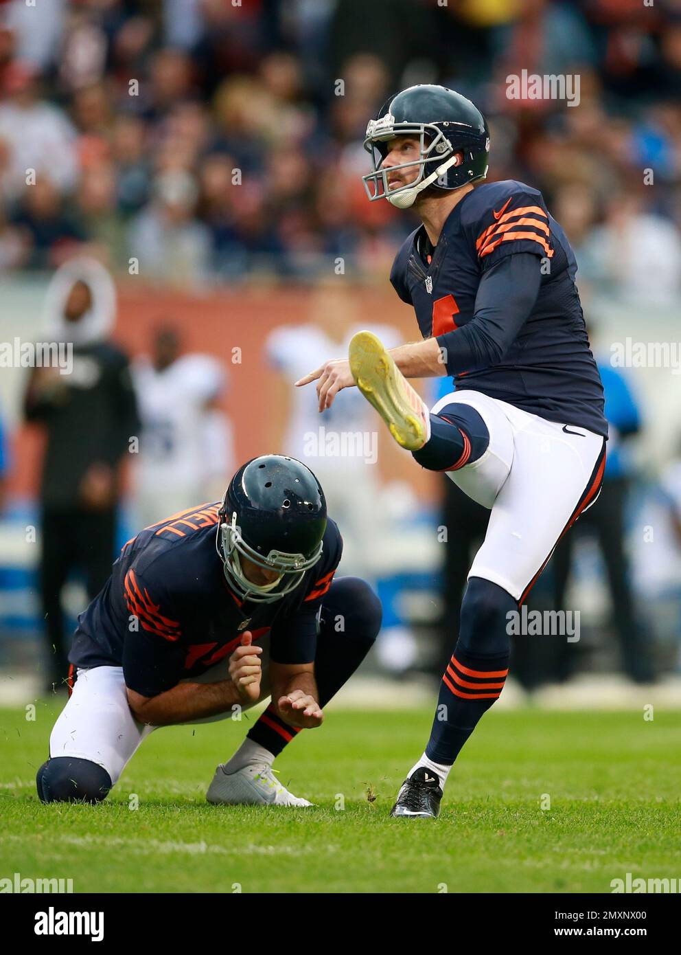 Chicago Bears kicker Connor Barth (4) kicks an extra point against the ...