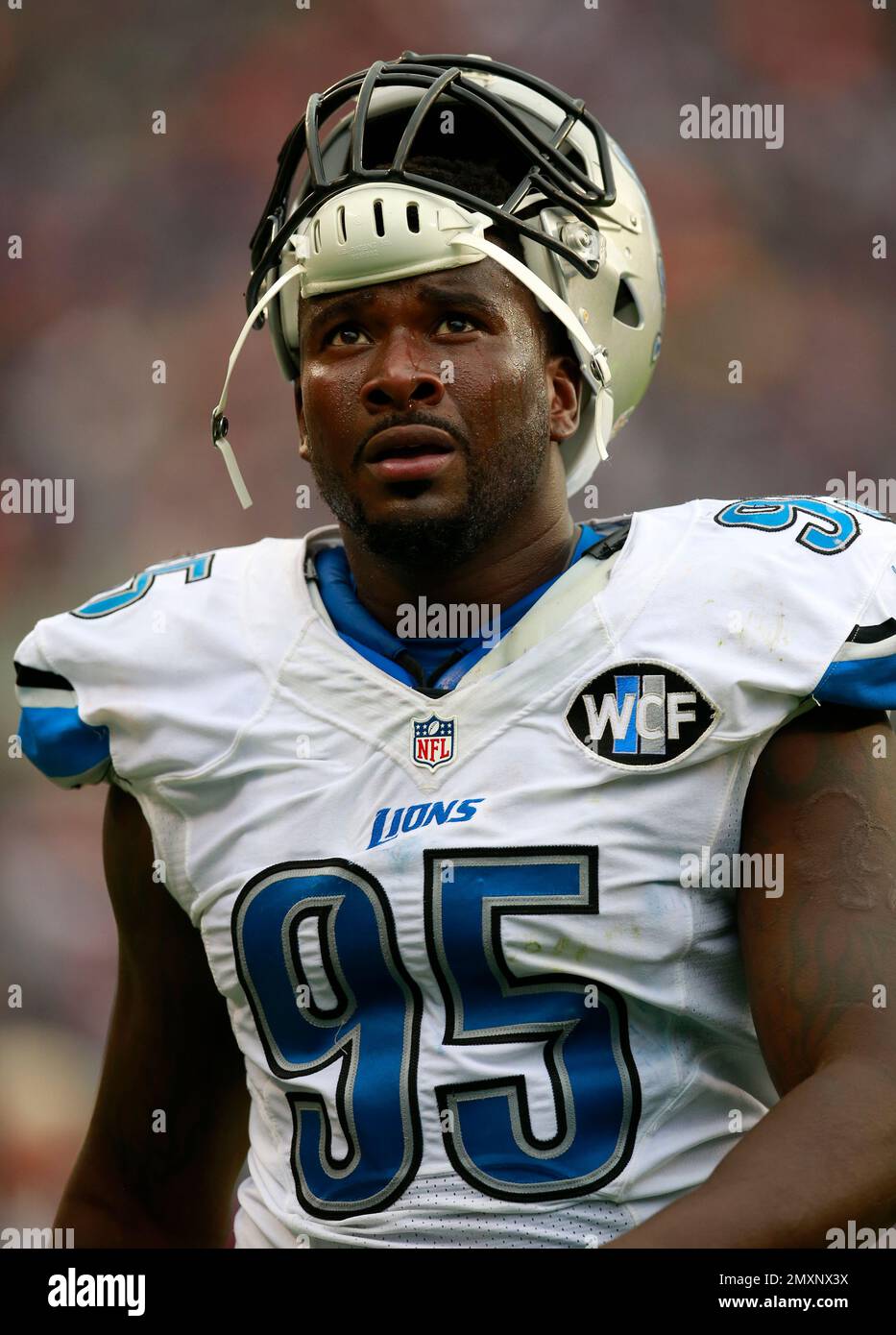 Detroit Lions defensive end Wallace Gilberry (95) walks off the field ...