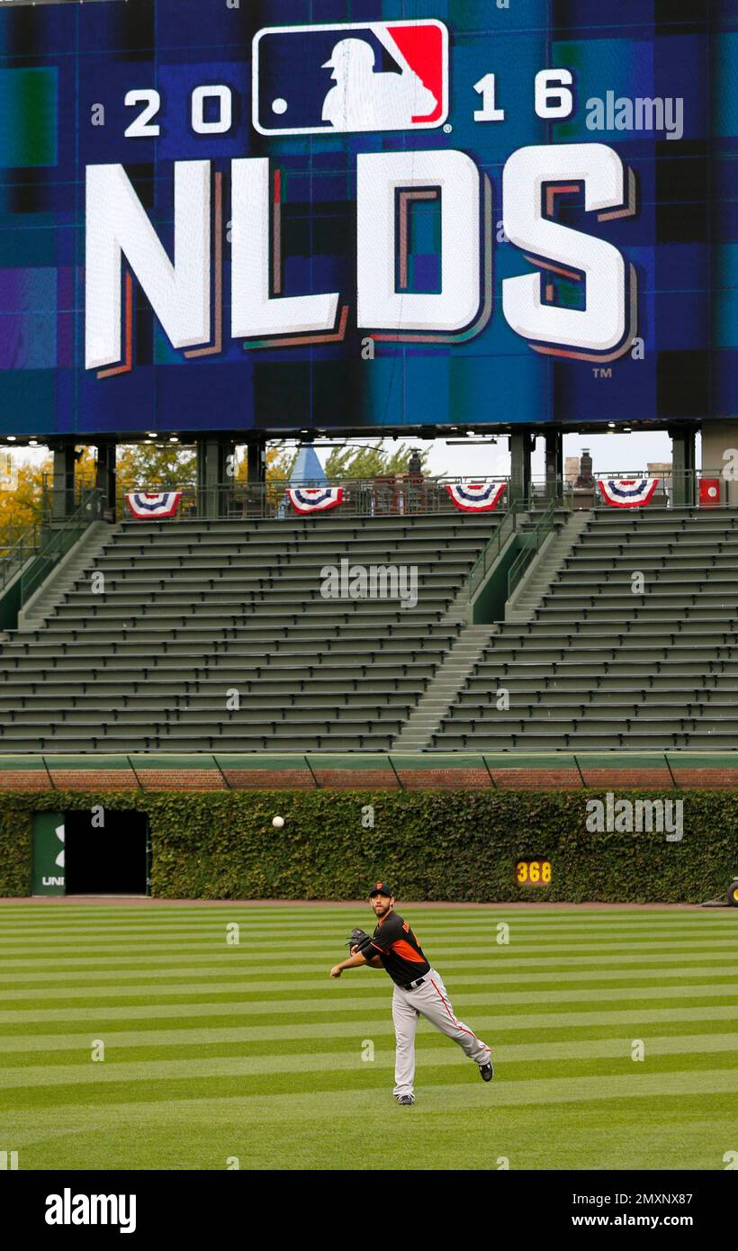 San Francisco Giants starting pitcher Madison Bumgarner warms up before ...