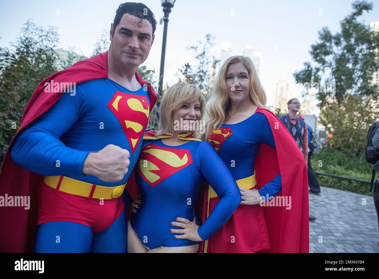 Superman fans Michael Byrnes, left, Frances Tirado, center, and Amy ...