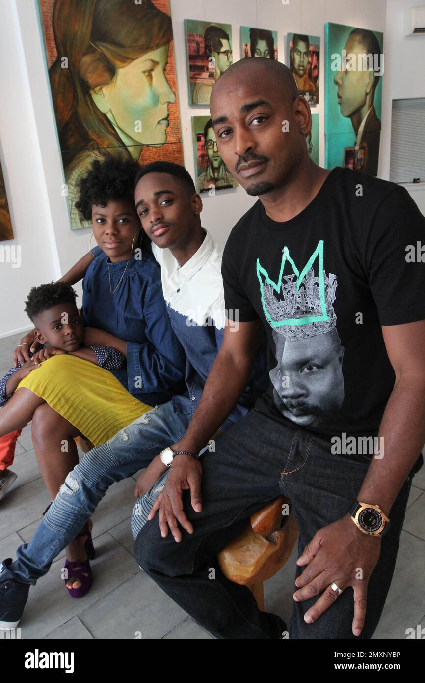 Richard Beavers, right, poses for a photograph with his wife Khalilah ...