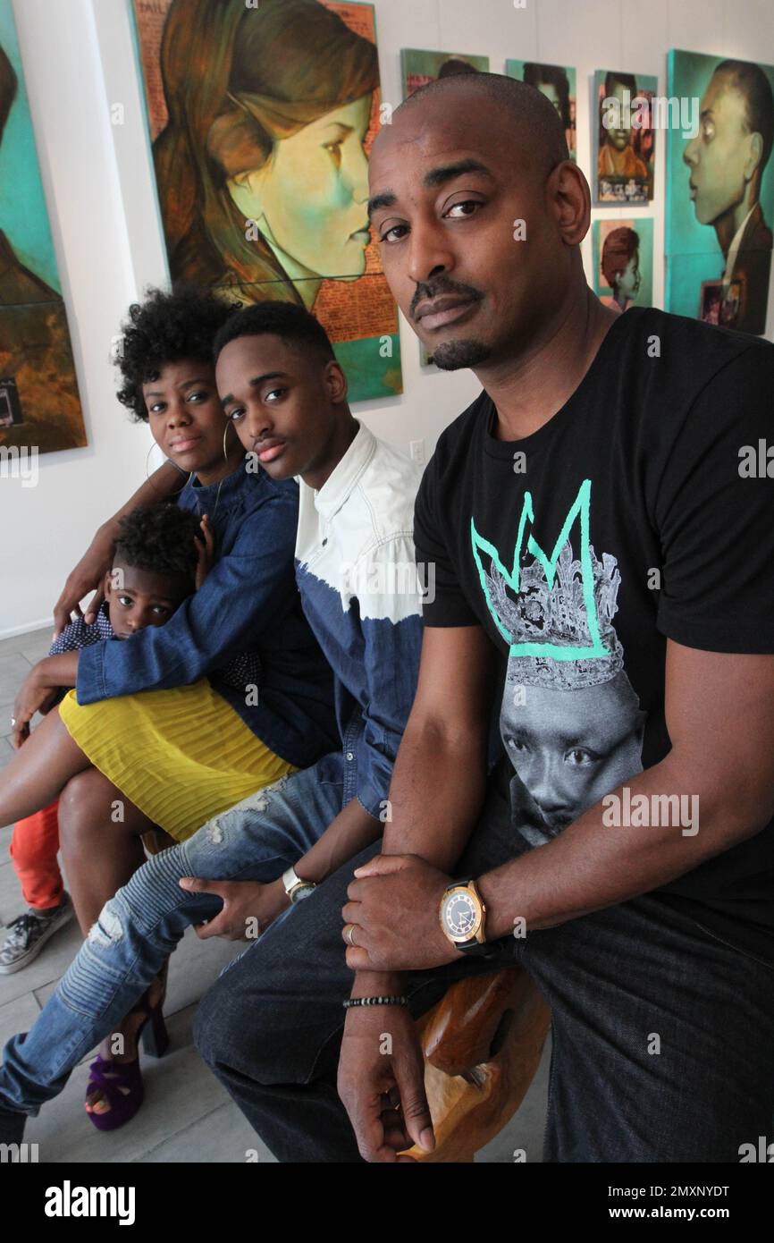 Richard Beavers, right, poses for a photograph with his wife Khalilah ...