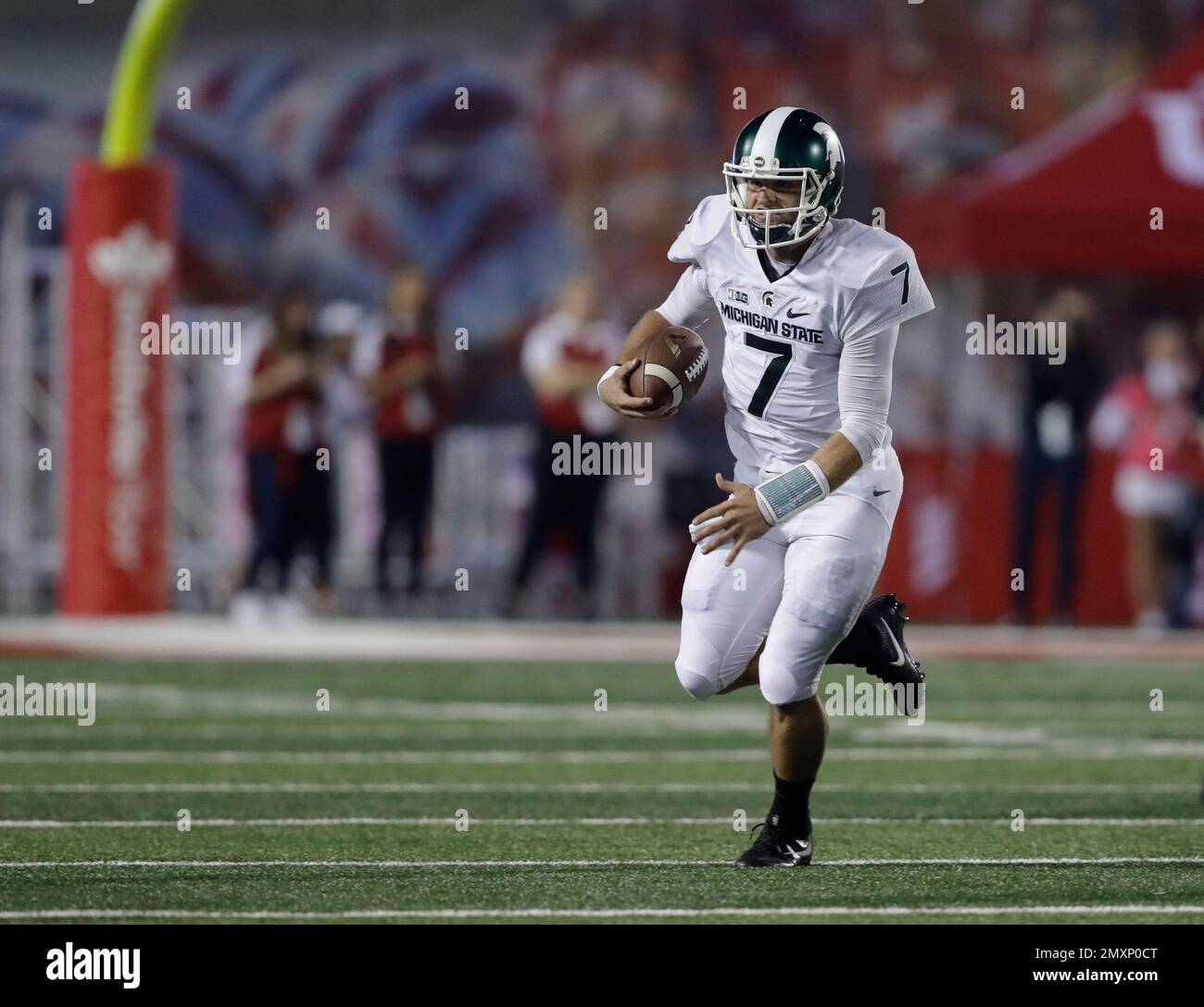 Michigan State quarterback Tyler O'Connor (7) runs during the first ...
