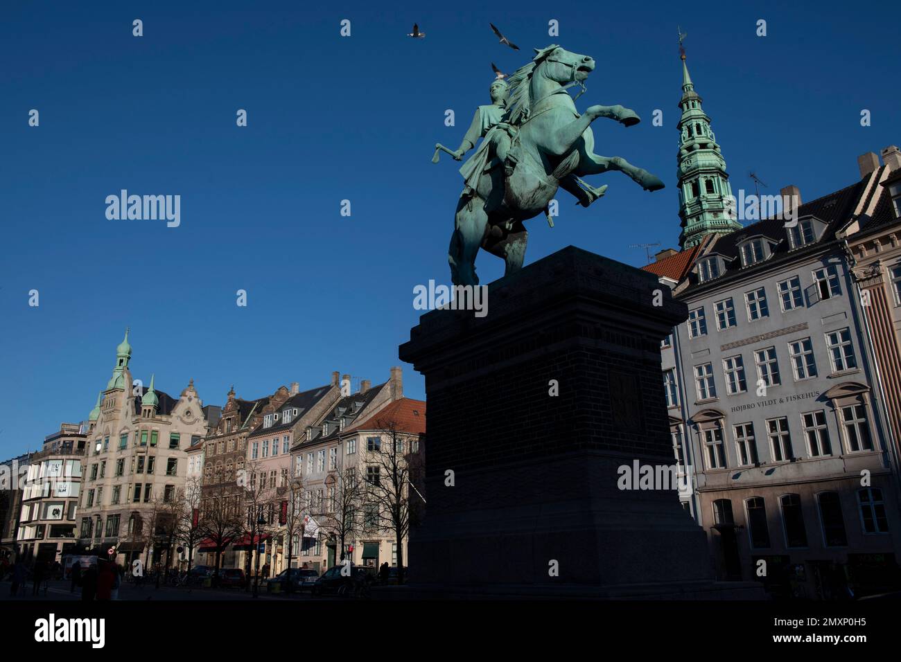 Equestrian statue of Bishop Absalon (founder of Copenhagen), with spire ...