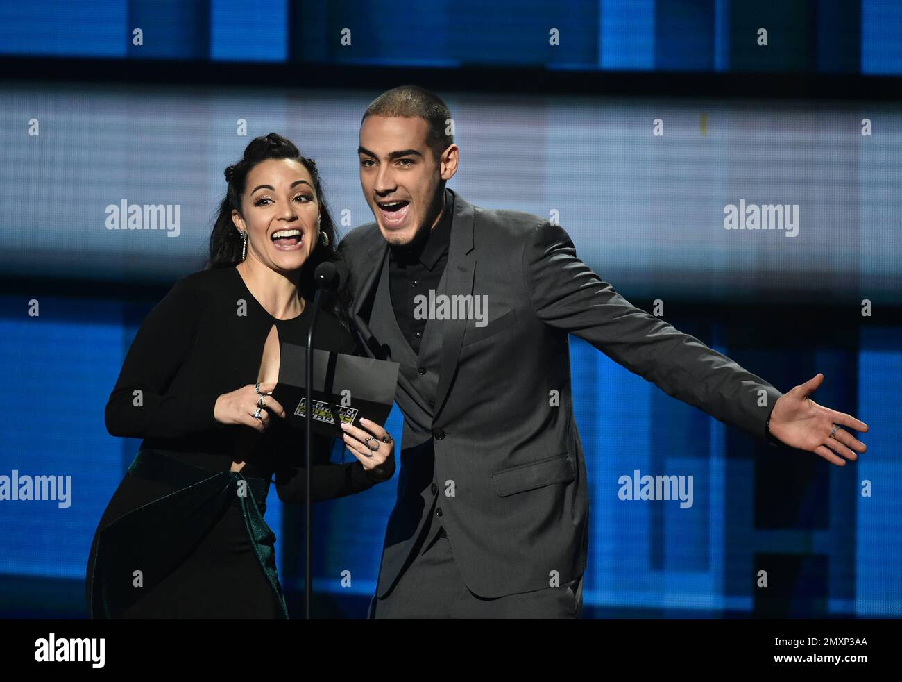 Sharlene Taule, left, and Michel Duval present the award for favorite ...