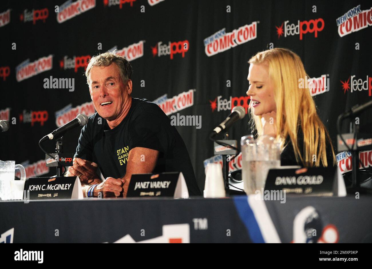 John C. McGinley, left, and Janet Varney speak onstage during the Stan ...