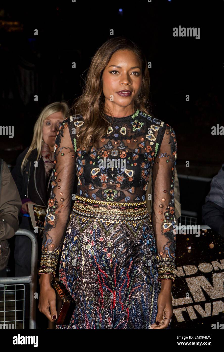 Actress Naomie Harris poses for photographers on arrival at the ...