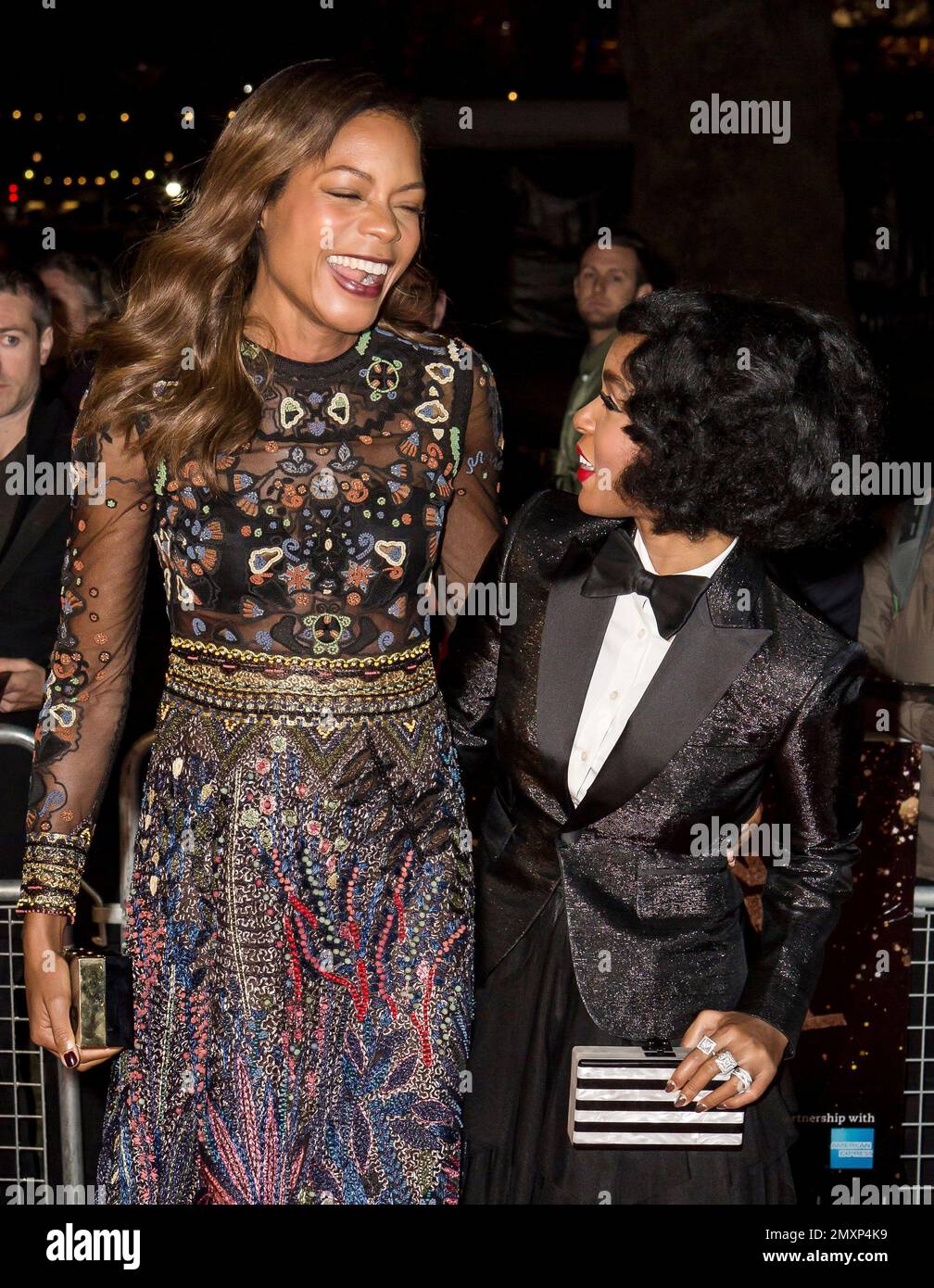 Actresses Naomie Harris, left, and Janelle Monae pose for photographers ...