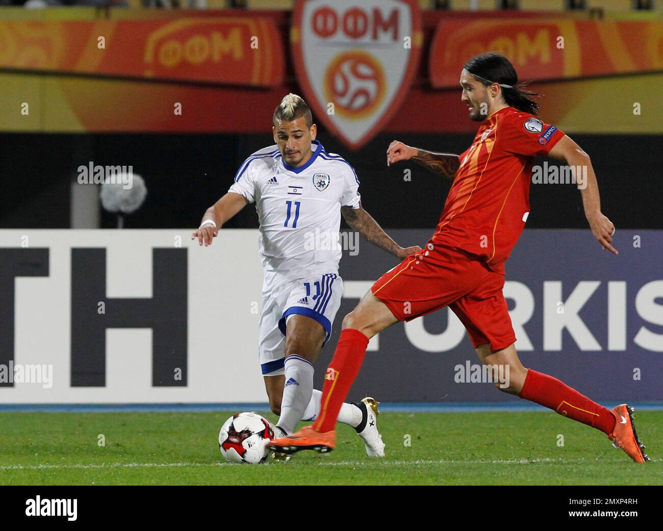 Israel’s Dan Einbinder, left, challenges with Macedonia’s Leonard Zhuta ...