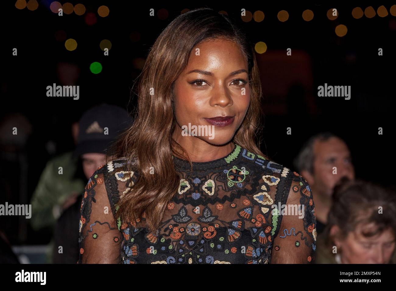 Actress Naomie Harris poses for photographers upon arrival at the ...