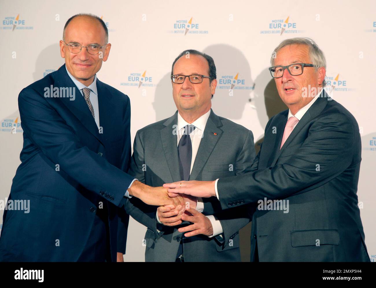 Former Italian Prime Minister Enrico Letta, left, French President ...