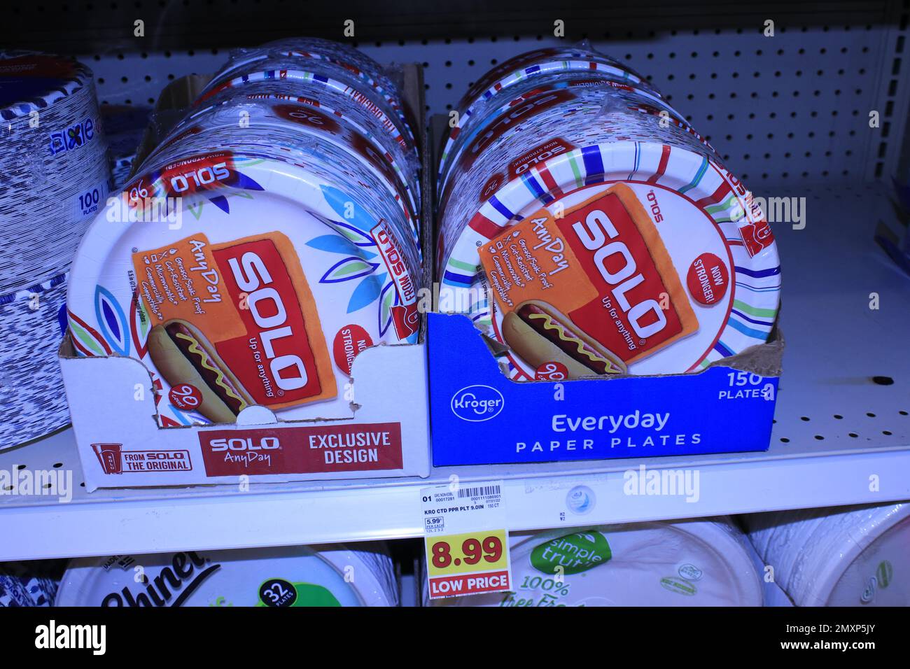 SOLO paper plates on a shelf shot closeup Stock Photo - Alamy