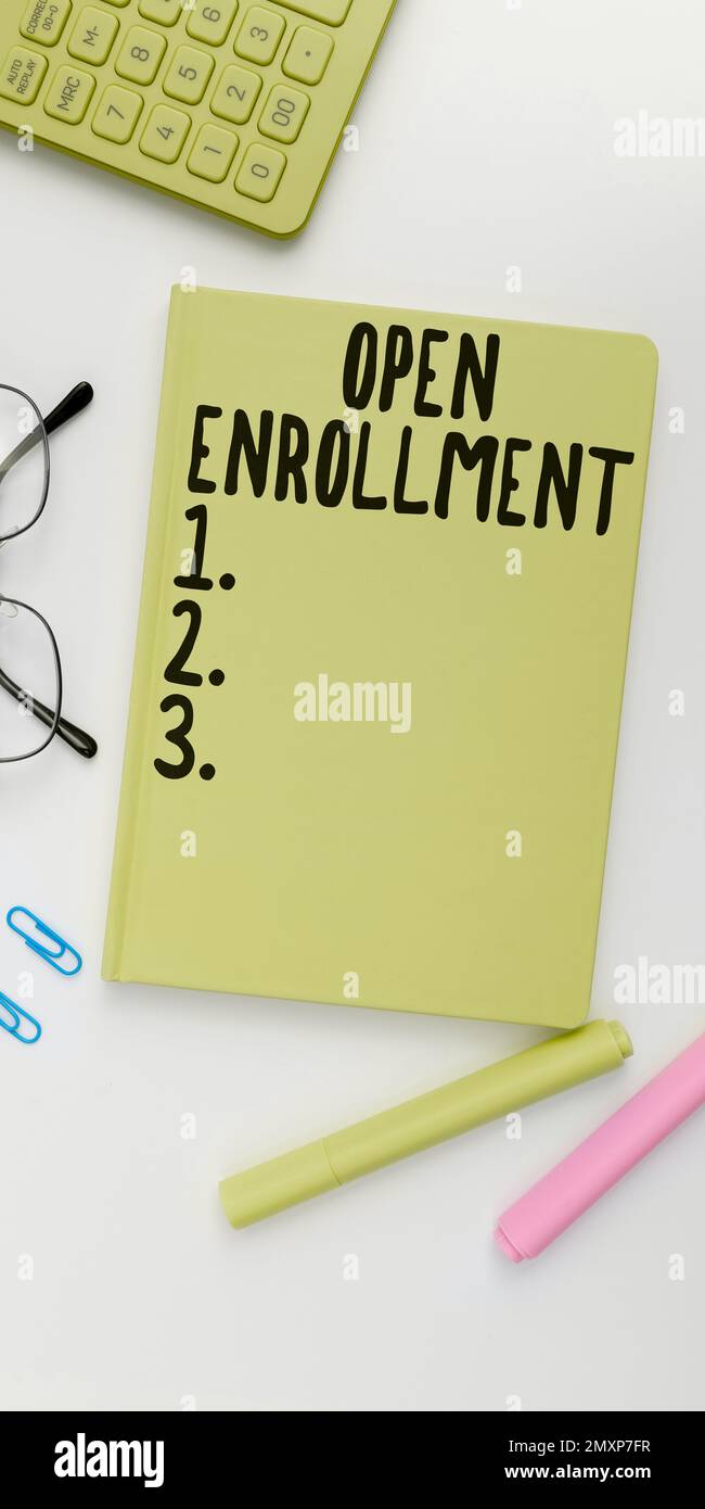 Conceptual caption Open Enrollment, Word Written on The yearly period ...