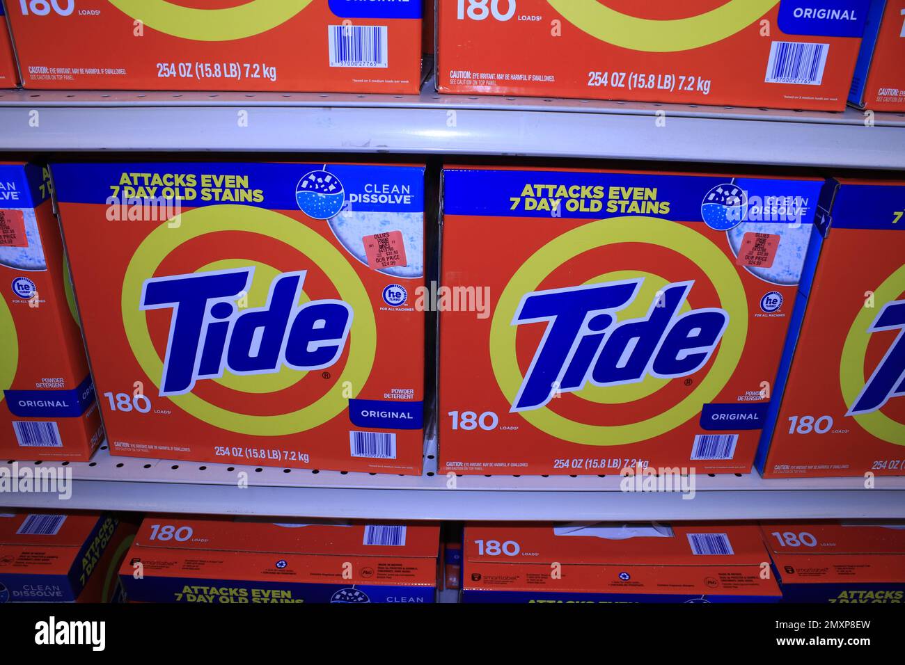 Powdered Tide in boxes on a shelf closeup Stock Photo - Alamy
