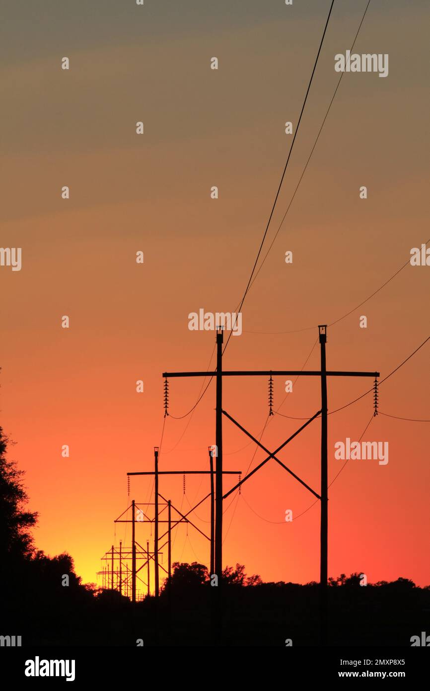 Electricity pylons and sunset hi-res stock photography and images - Alamy