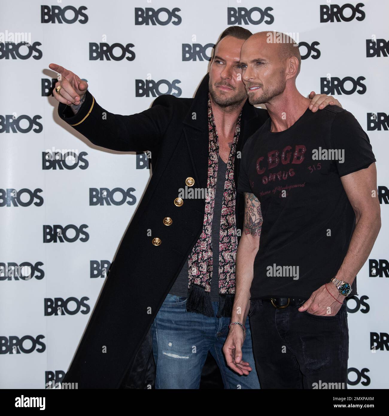 Musicians Matt Goss and Luke Goss pose for photographers during a photo ...