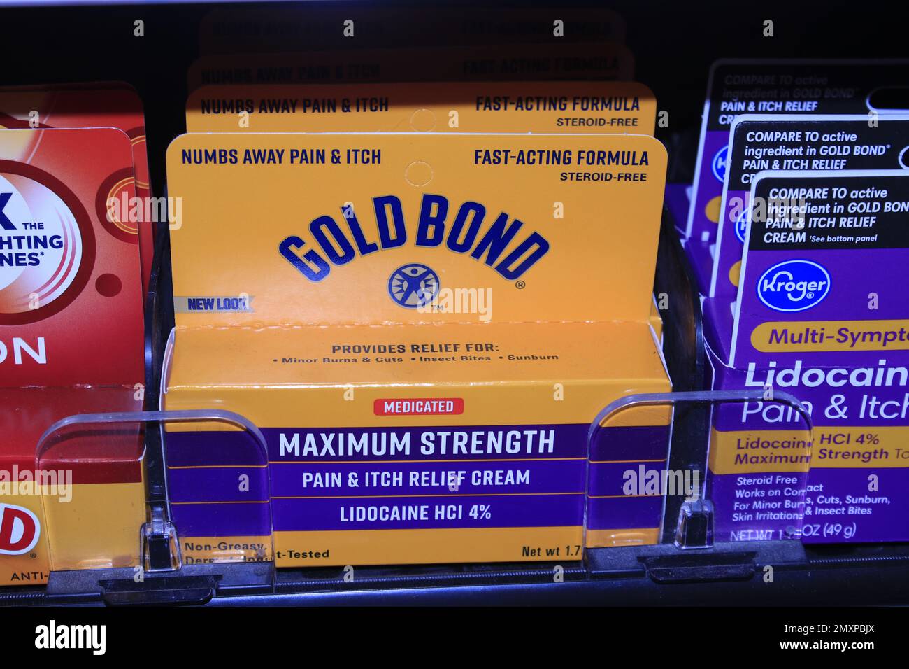 GOLD BOND pain reliever in boxes on a shelf in a store Stock Photo - Alamy