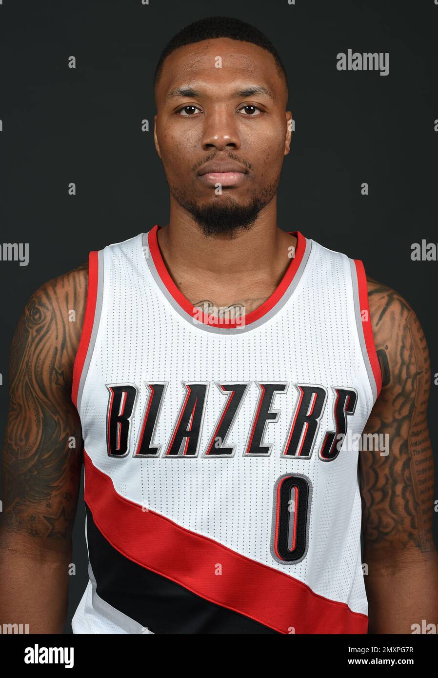 Portland Trail Blazers guard Damian Lillard (0) poses for a photograph ...