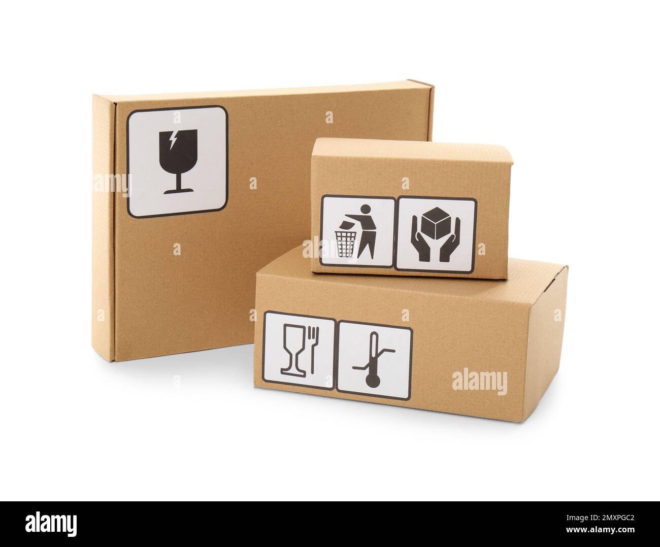 Cardboard boxes with different packaging symbols on white background ...