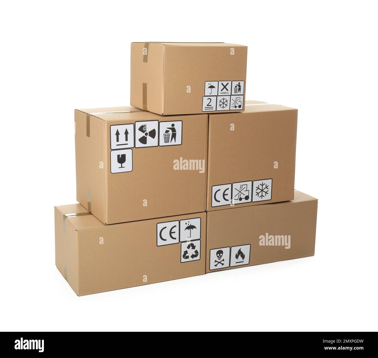 Stack of cardboard boxes with different packaging symbols on white ...
