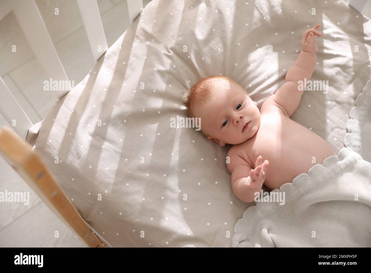 Cute little child lying in cot, above view. Healthy baby Stock Photo ...