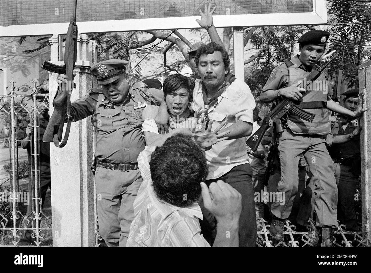 FILE - In this Oct 6, 1976 file photo a right-wing student, center ...