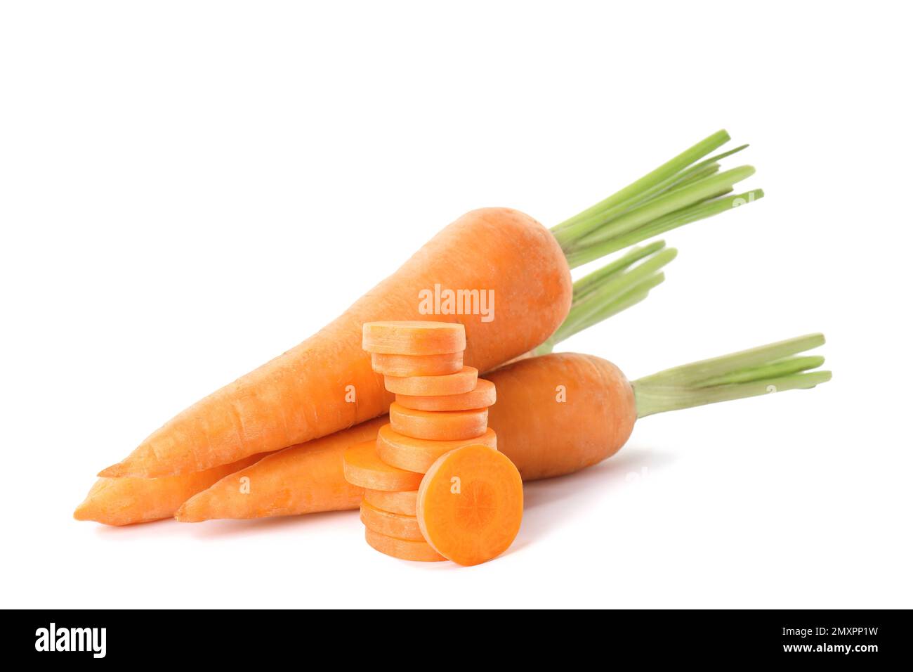 Whole and cut ripe carrots isolated on white Stock Photo - Alamy