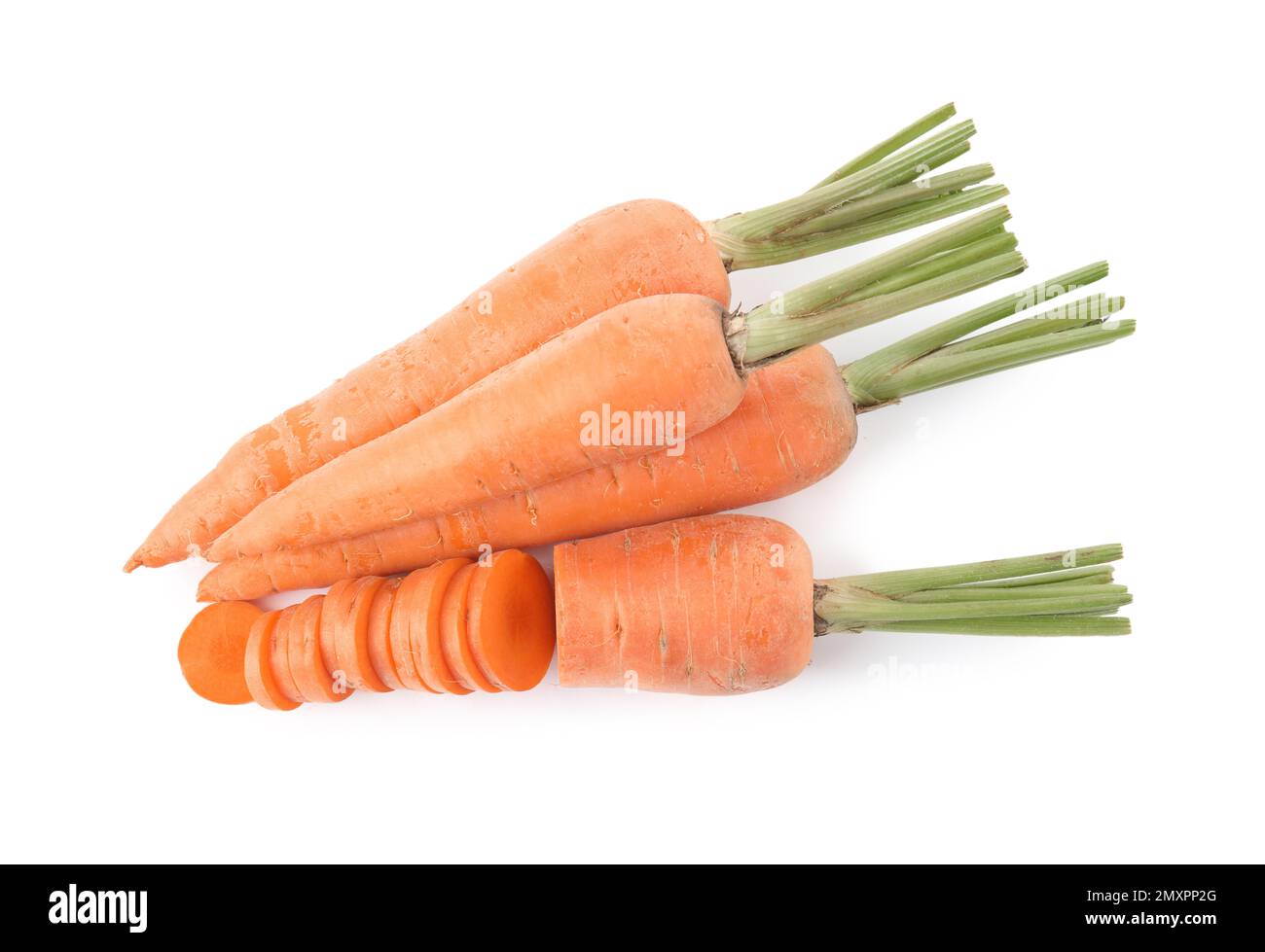 Whole and cut ripe carrots isolated on white, top view Stock Photo - Alamy