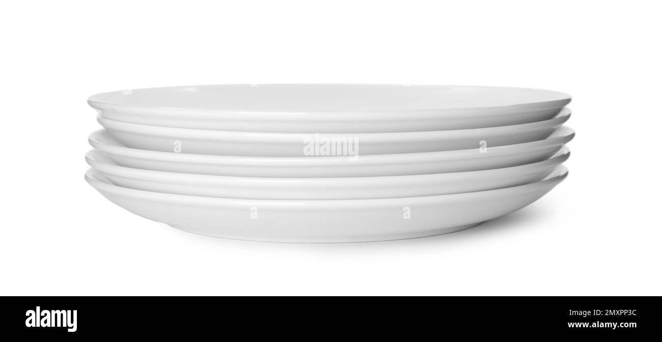 Stack of clean plates isolated on white Stock Photo - Alamy