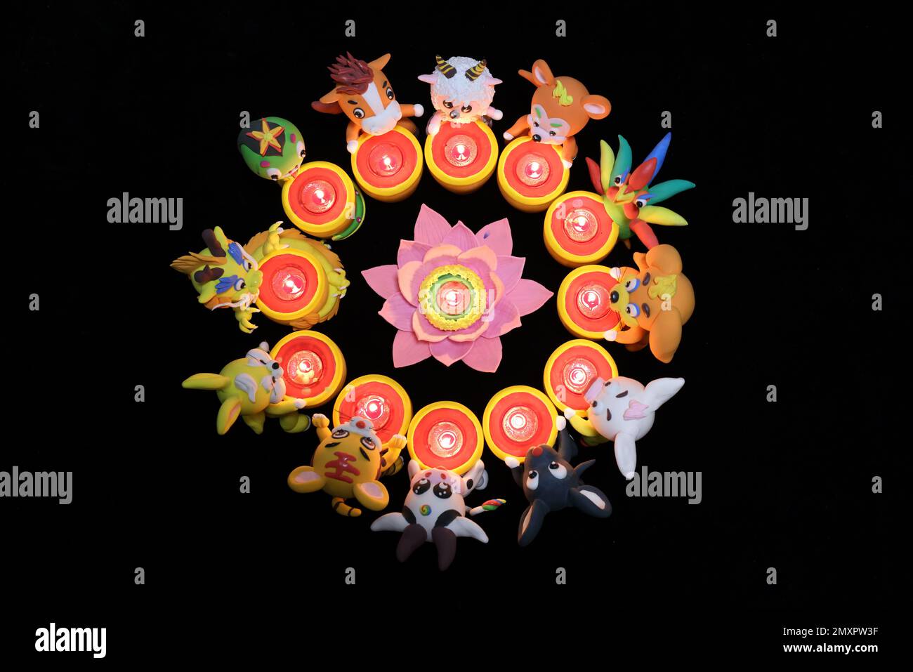 ZAOZHUANG, CHINA - FEBRUARY 4, 2023 - Folk artist Zhang Ting lights up ...