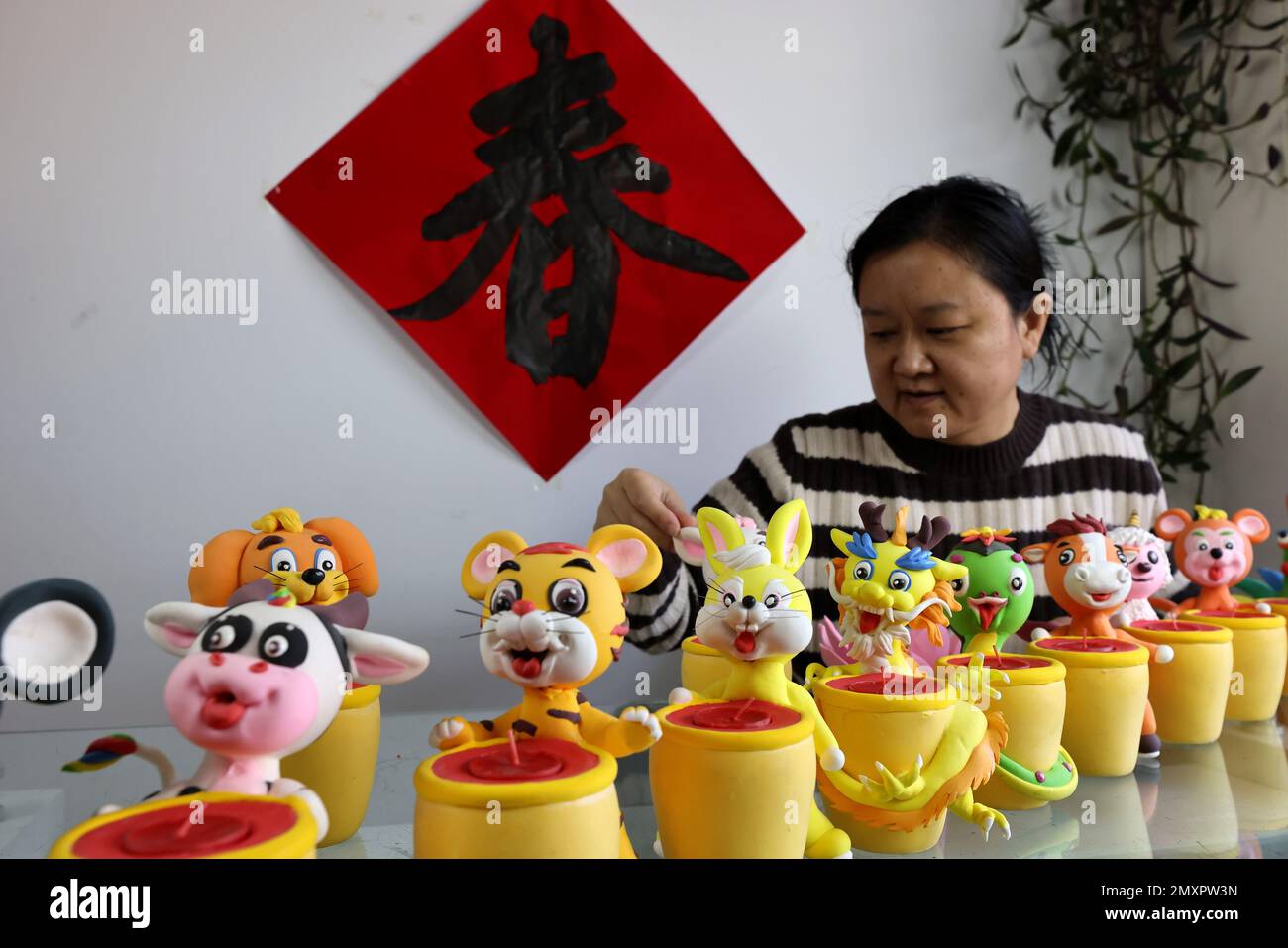 ZAOZHUANG, CHINA - FEBRUARY 4, 2023 - Folk artist Zhang Ting makes "12 ...
