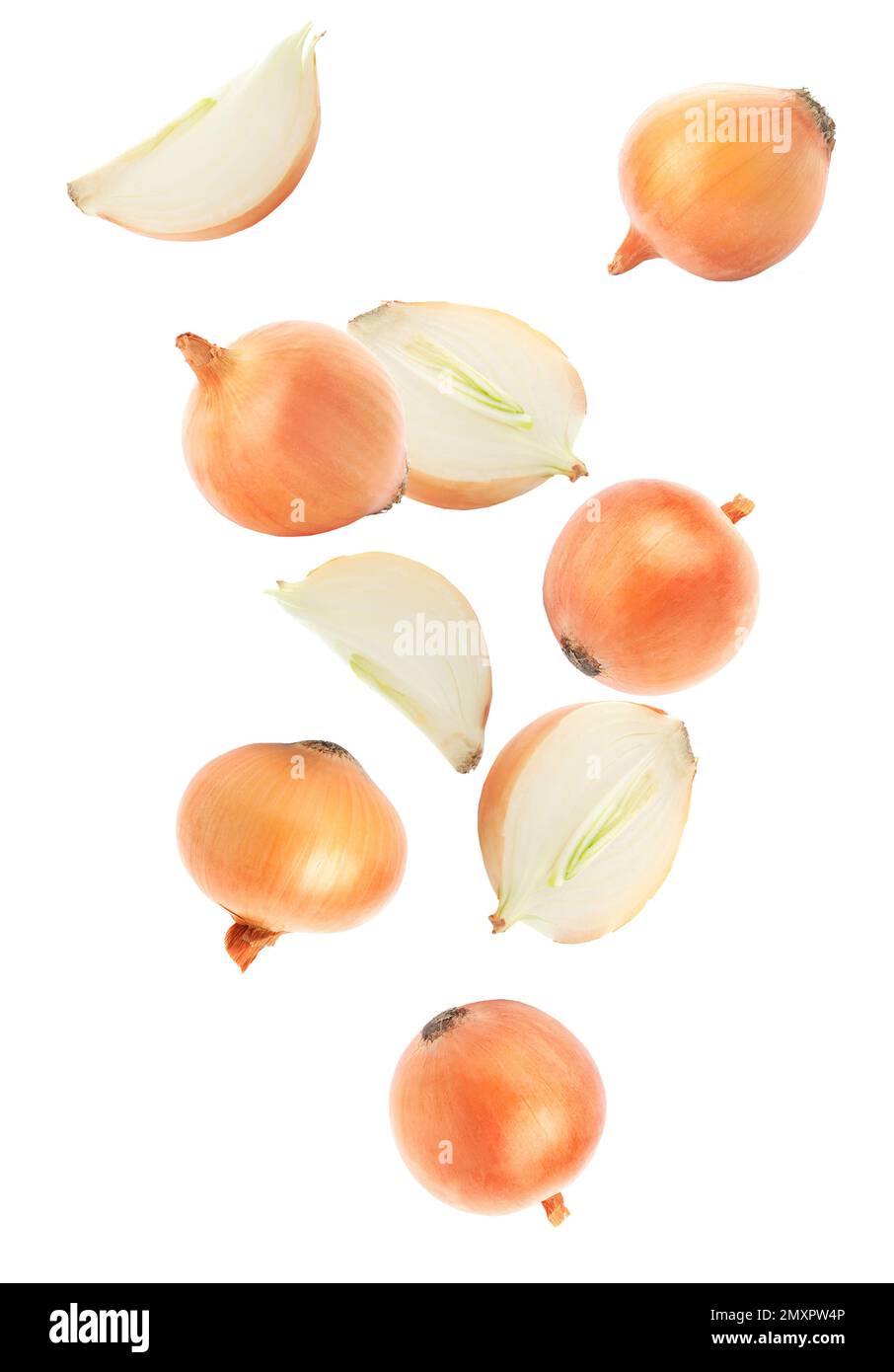 Cut and whole onion bulbs falling on white background Stock Photo - Alamy