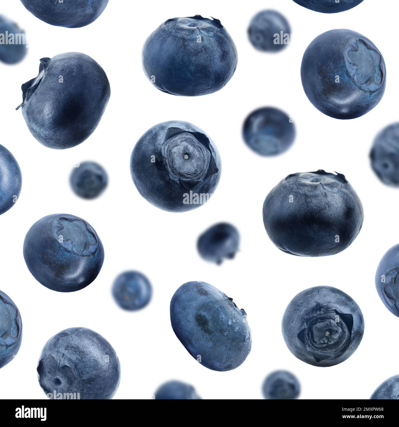 Many fresh ripe blueberries falling on white background Stock Photo - Alamy