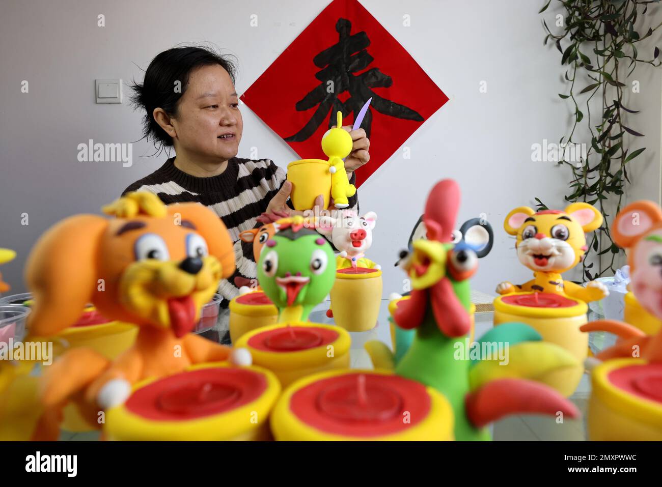 ZAOZHUANG, CHINA - FEBRUARY 4, 2023 - Folk artist Zhang Ting makes "12 ...