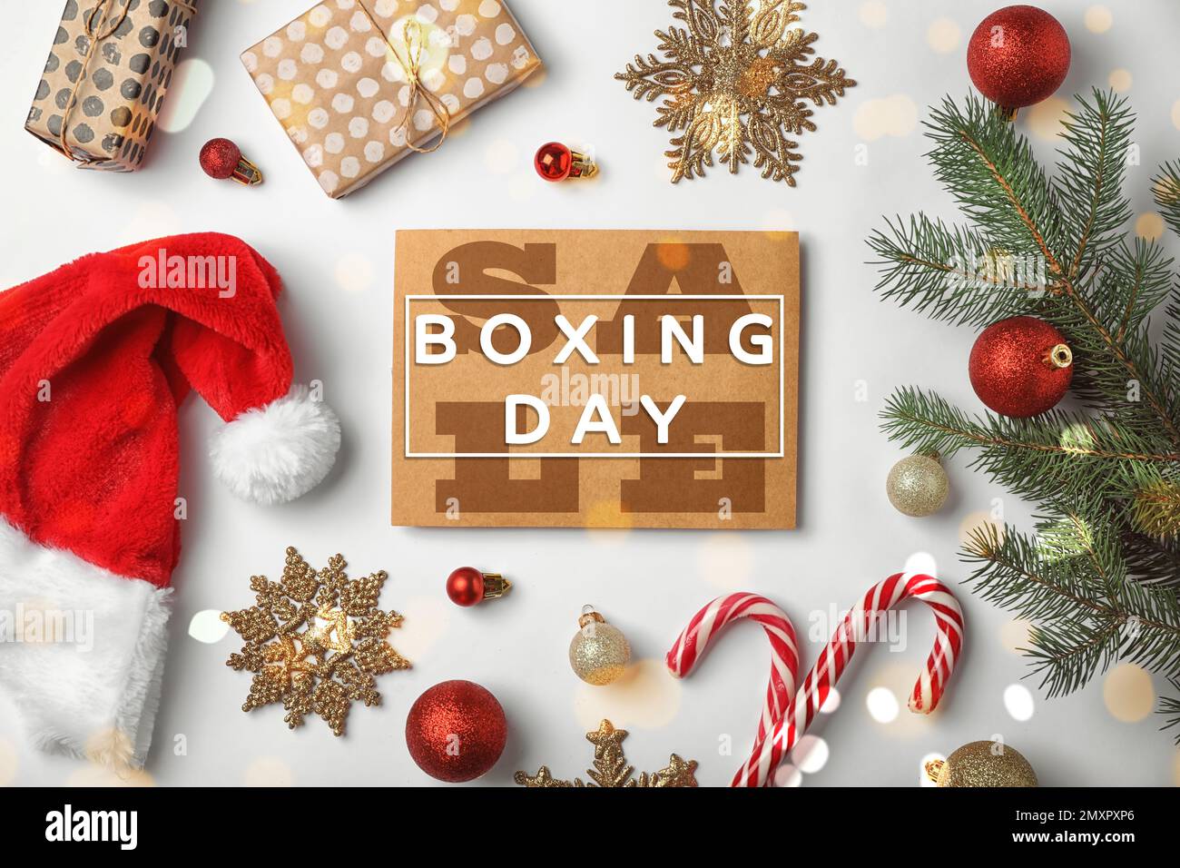 Flat lay composition with text Boxing Day Sale and Christmas gifts on ...